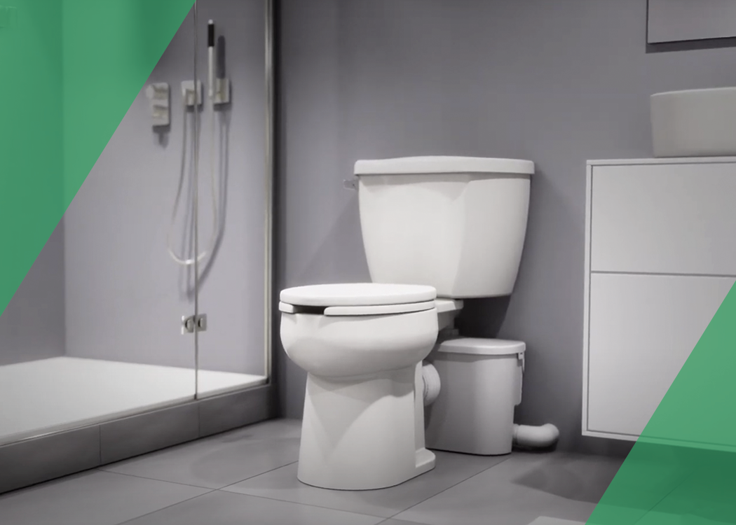 What makes a rear discharge toilet a viable option?